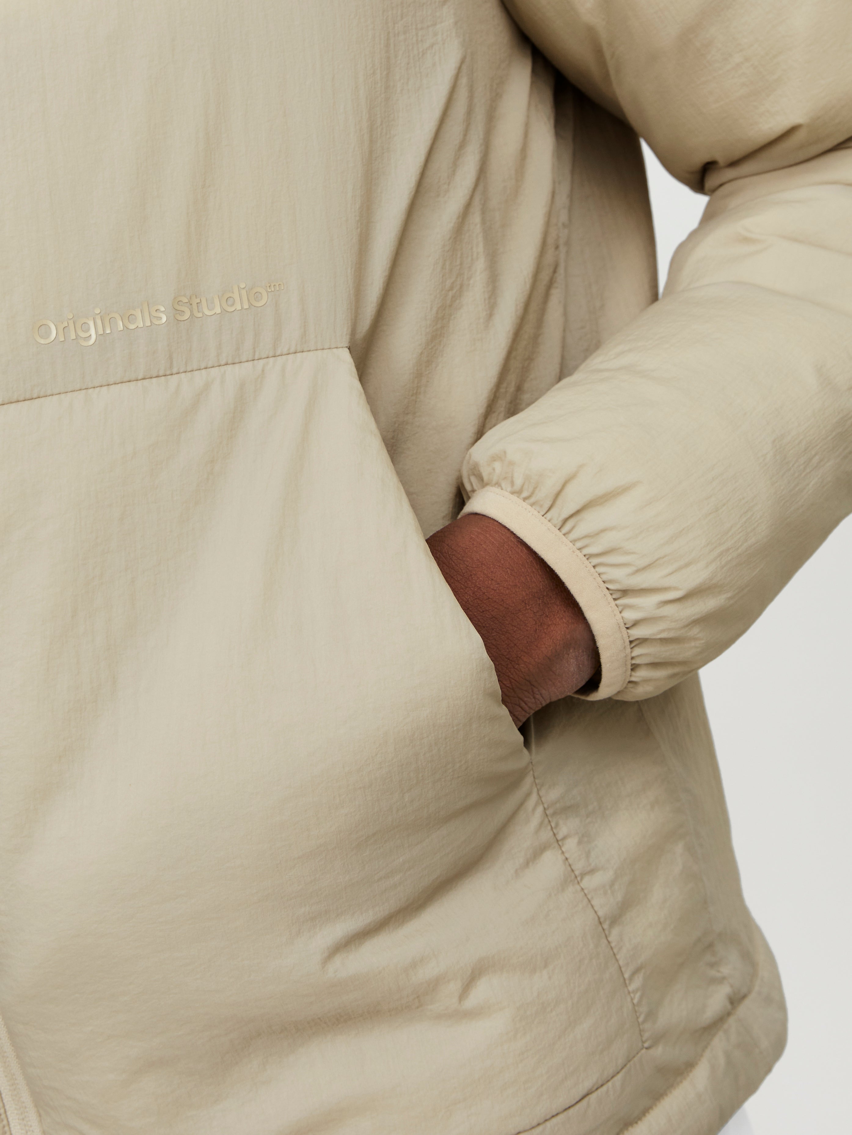 Hood with string regulation Cuffs with elastic binding Jacket | Beige ...